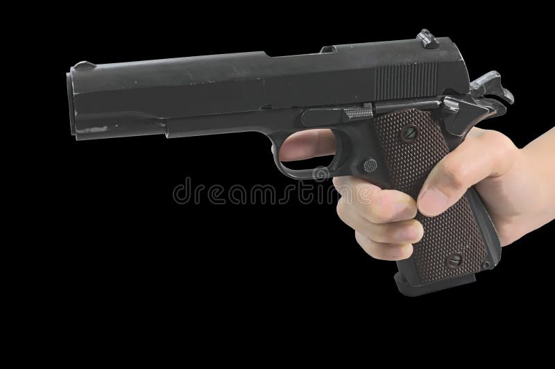 Hand holding a loaded gun stock image. Image of isolated - 40222035