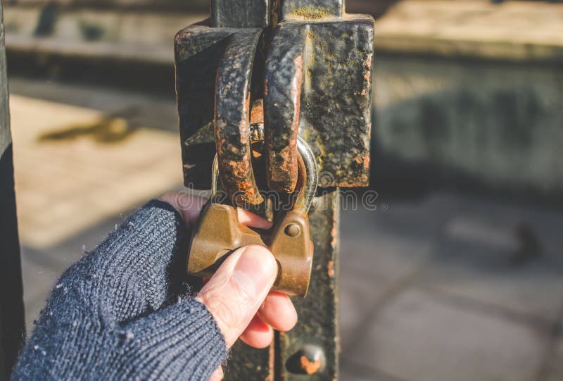 Hand Holding a Lock. Burglary and Security Concept Stock Image - Image ...