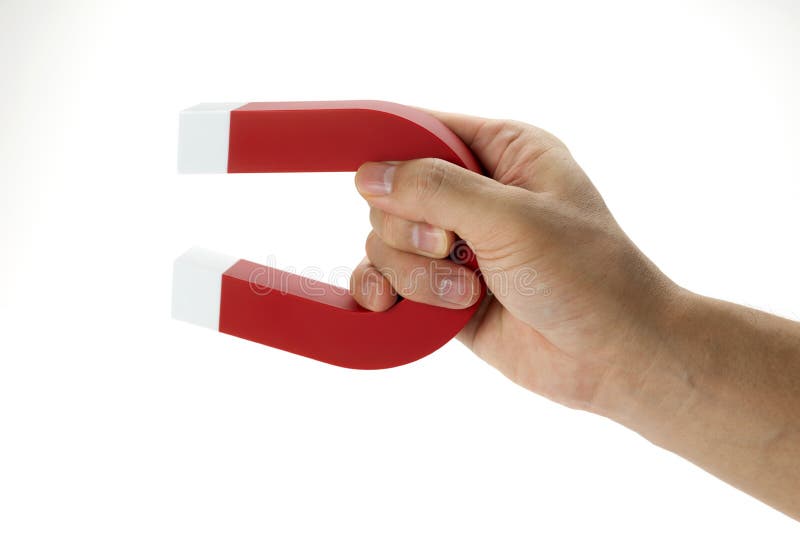 Magnet Pulling Ball Bearings Physical Attraction Stock Image - Image of ...