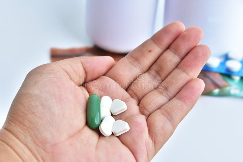 Hand holding medicine. stock photo. Image of healthcare - 91203008