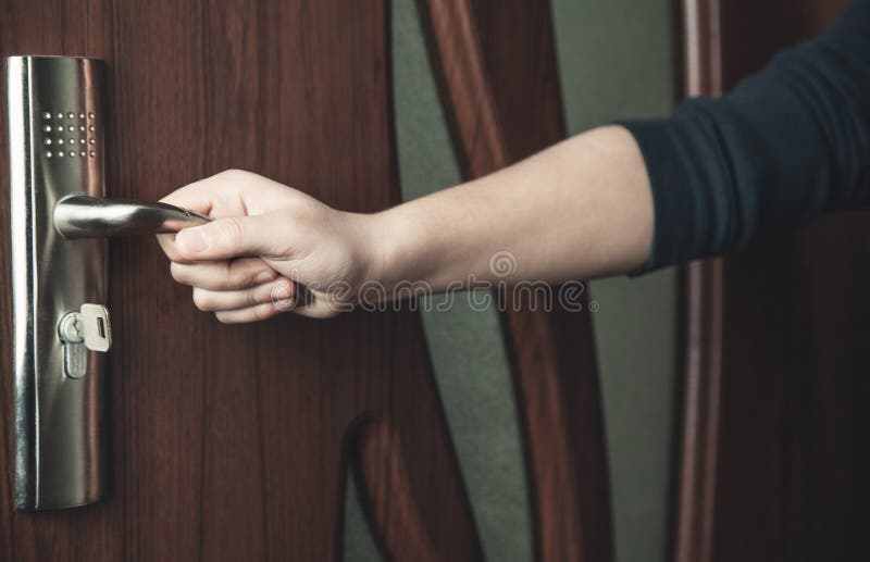 Hand Holding a Metal Handle in the Door. Stock Image - Image of lock ...