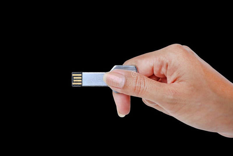 Hand Holding Metal Key USB Data Storage Isolated on Black Background ...