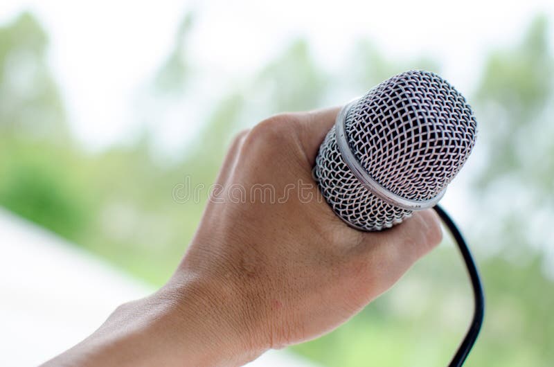 338 Hand Holding Retro Microphone Stock Photos - Free & Royalty-Free ...