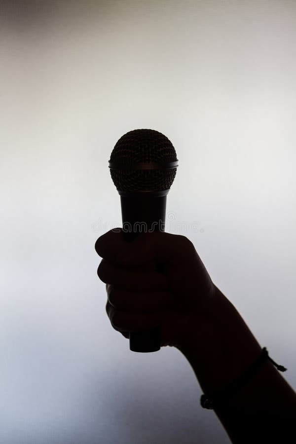 Hand and microphone stock image. Image of metal, hand - 29191377