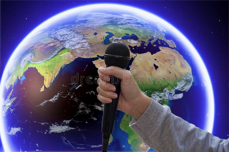 Hand Holding Microphone on World Communication Earth. Stock Image ...