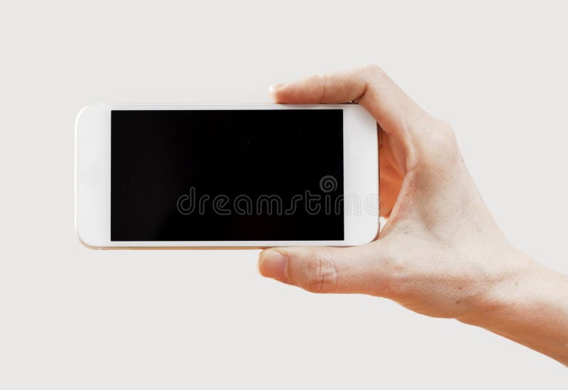 Hand holding mobile phone stock image. Image of female - 84381271