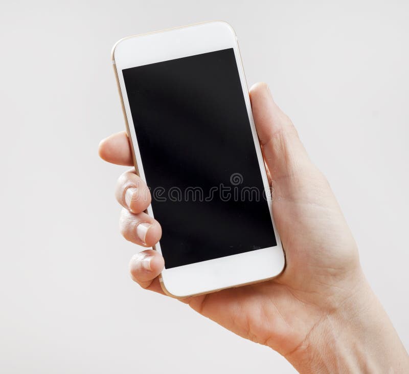 Hand holding mobile phone stock photo. Image of hand - 84385582
