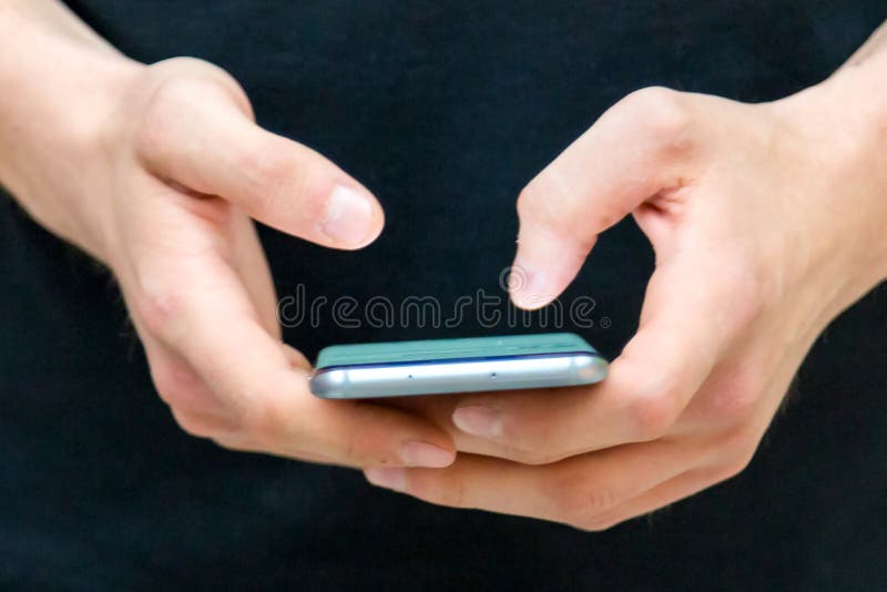 Hand Holding the Mobile Phone Close Up Stock Image - Image of ...