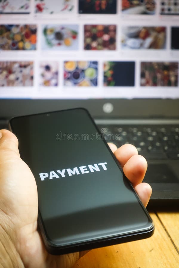 A Hand Holding Mobile Phone Doing Online Shopping , Online Payment ...
