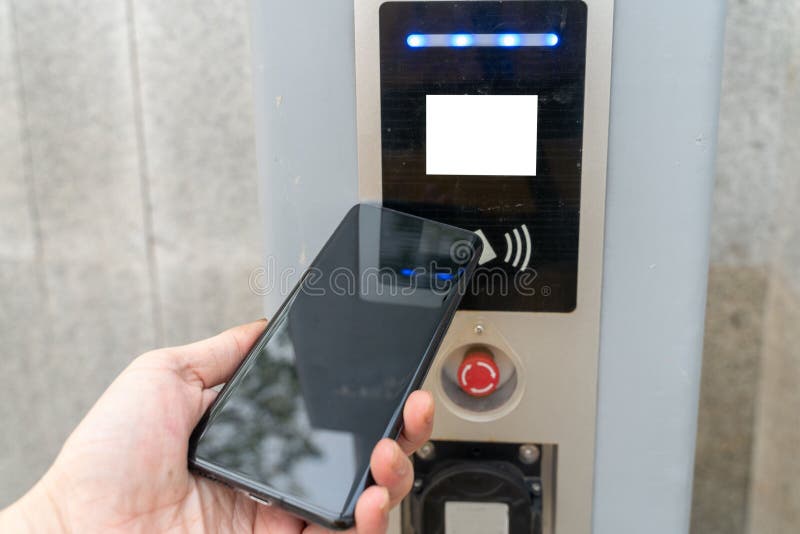 Hand Holding a Mobile Phone To Connect and Scan the Personal ...