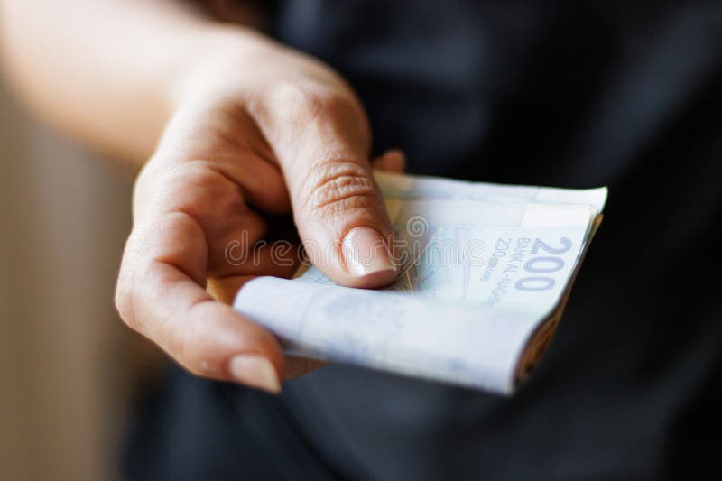 Hand Holding Moroccan Banknotes, Dirham Official Currency of Morocco ...