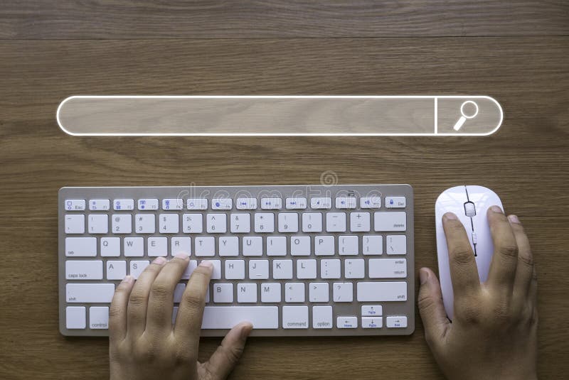 Hand Holding Mouse and Computer Keyboard with a Search Bar Icon Stock ...