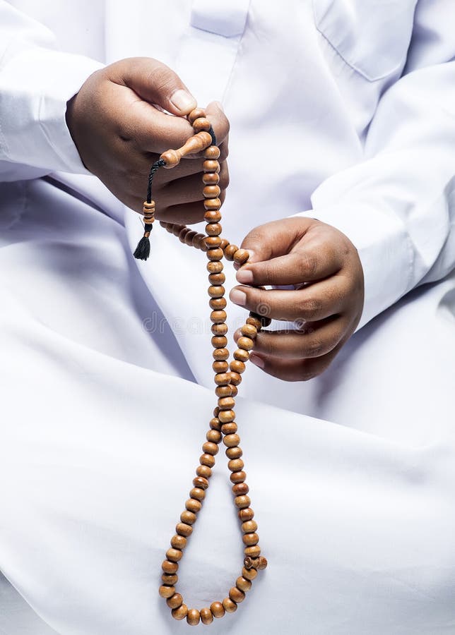 Hand Holding a Tasbih stock photo. Image of elegant, religion - 35845238 Hand Holding a Tasbih stock photo. Image of elegant, religion - 35845238