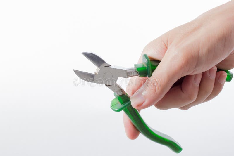 Hand With Nippers And Blue Cable On White Background, Electrical ...