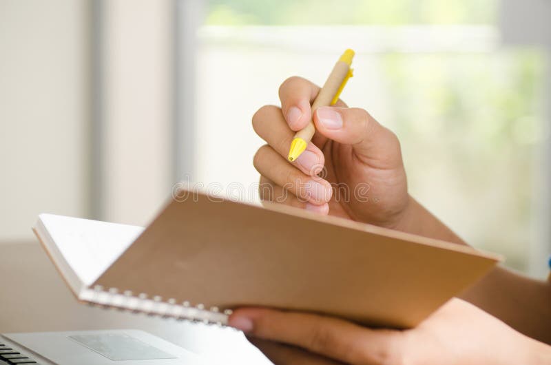 Hand Holding Notebook and Pen Stock Image - Image of learn, notepad ...
