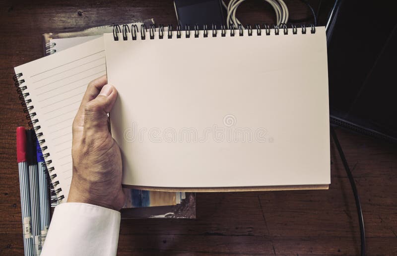Hand holding notebook stock image. Image of notebook - 67362663