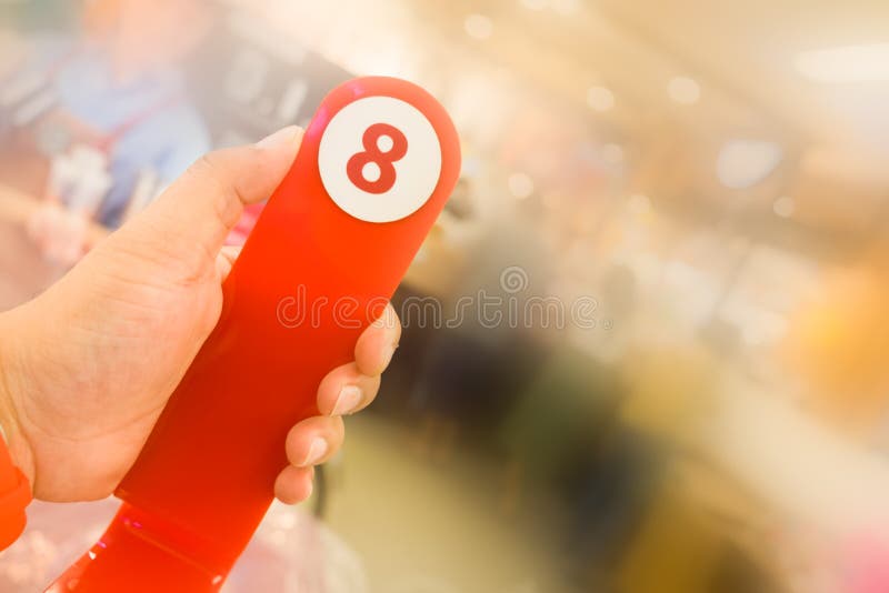 Hand holding number queue stock photo. Image of financial - 110845282
