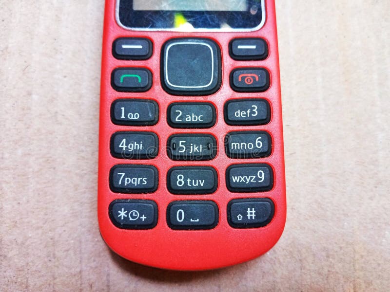 Hand Holding Old Mobile Phone with Texting or SMS Button Keyboard or ...