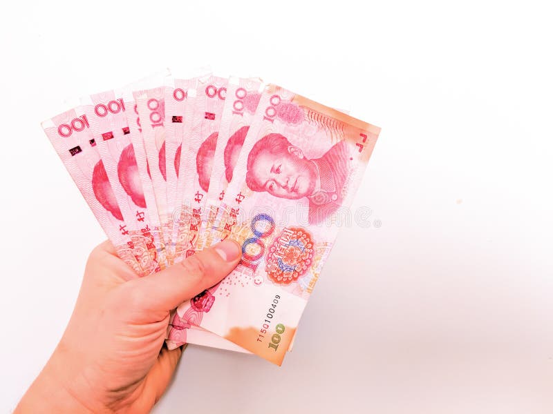Hand Holding One Hundred Yuan Notes Against White Background with Copy ...