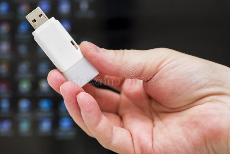Hand Holding One USB Flash Drive. a Female Hand Holding a USB Flash ...