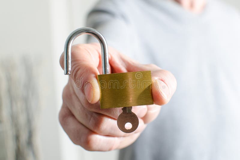 Hand Holding an Opened Padlock Stock Photo - Image of closed, concept ...