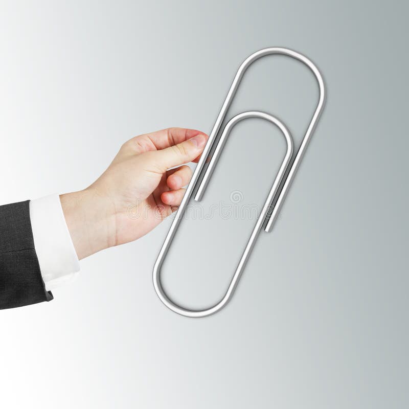3+ Hand holding paperclip Free Stock Photos - StockFreeImages