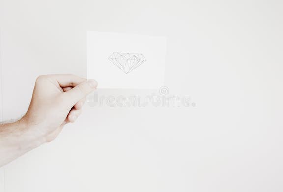 Hand Holding a Paper with a Drawing of a Diamond Stock Image - Image of ...
