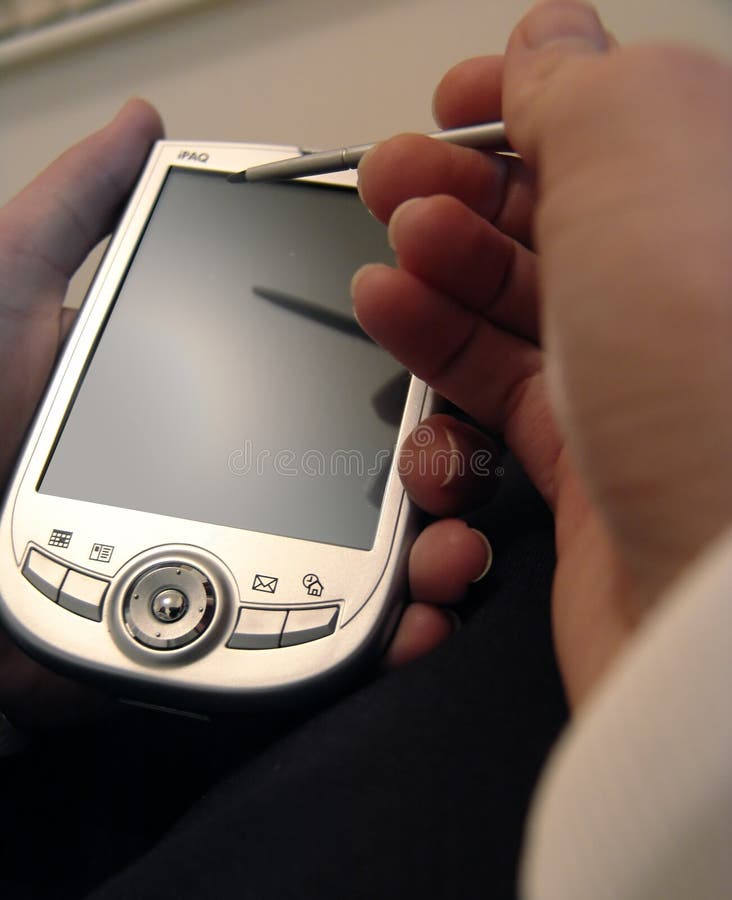 Hand Holding PDA stock photo. Image of technology, portable - 196220