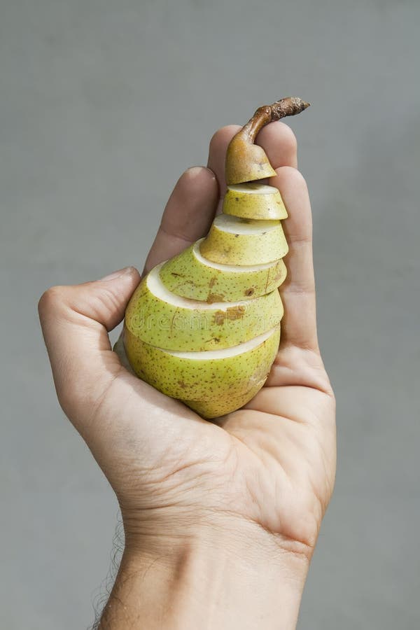 Hand holding a pear stock image. Image of hand, stem - 21093089
