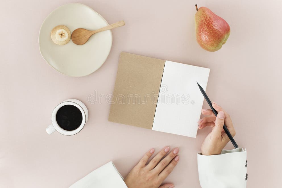 Hand Holding Pen Writing Down a Note Stock Photo - Image of page ...
