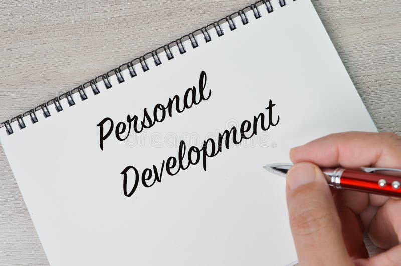 Hand Holding Pen and Writing Text PERSONAL DEVELOPMENT Stock ...