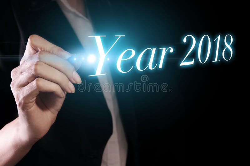Hand Holding a Pen and Writing Year 2018 Stock Image - Image of hand ...