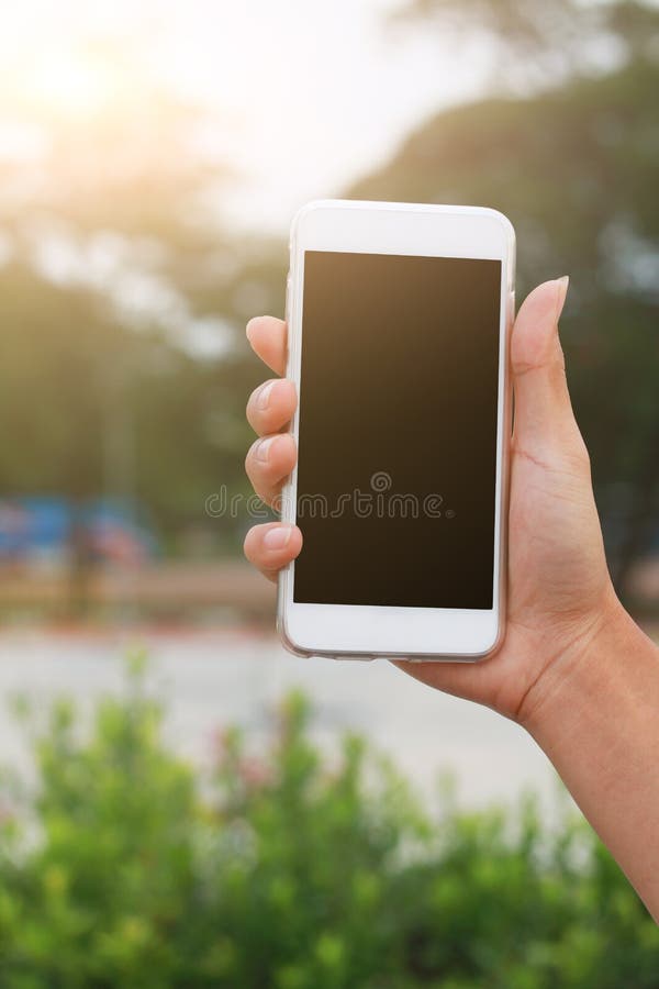 Hand Holding Phone Isolated on Black Clipping Inside Stock Photo ...