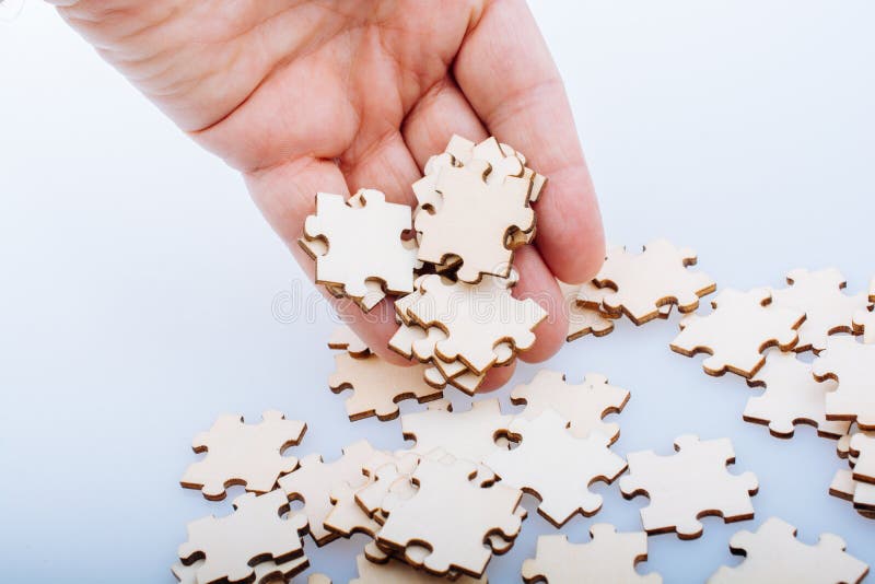 Hand Holding Piece of Jigsaw Puzzle As Problem Solution Stock Image ...