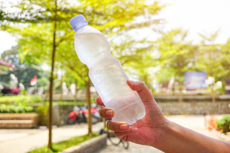 Hand Holding Plastic Water Bottle. Fresh Water in the Bottle Stock ...