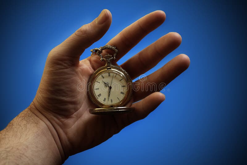 Hand holding pocket watch stock photo. Image of holding - 8661688