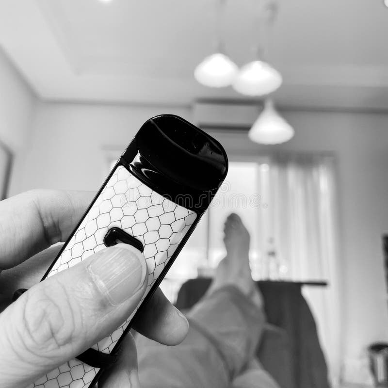 A Hand Holding POD Electric Ciggarete Stock Image - Image of hand ...