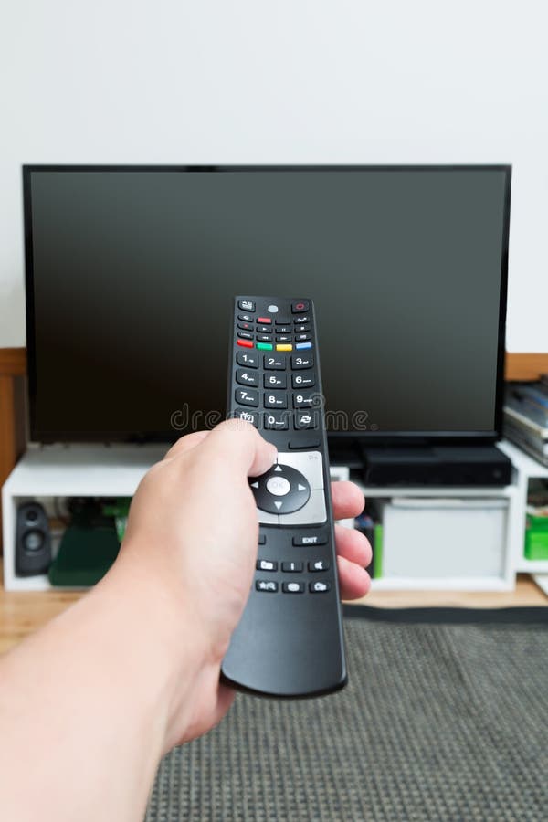 Hand Holding and Pointing Remote Control Stock Photo - Image of ...