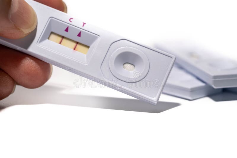 Hand Holding a Positive Antigen Test Result. Covid Positive Test Result ...