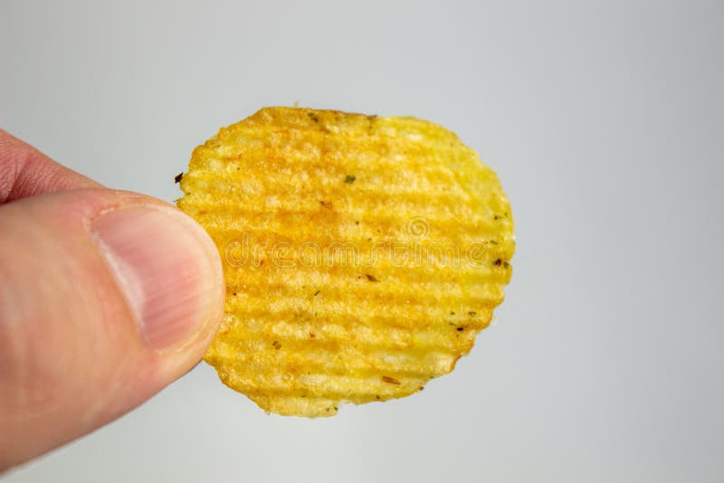 Hand Holding Potato Chips on White Background Stock Image - Image of ...