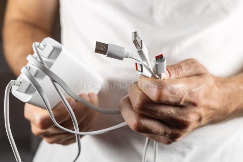 Hand Holding Powerbank with Cable. Power Saving Device Power Bank Stock ...