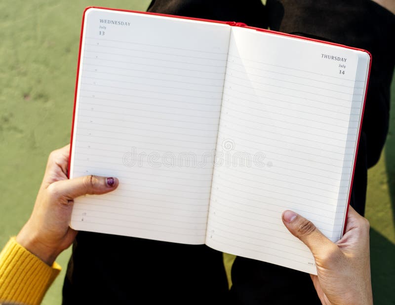 Hand Holding Reading Diary Notebook Stock Image - Image of hold ...