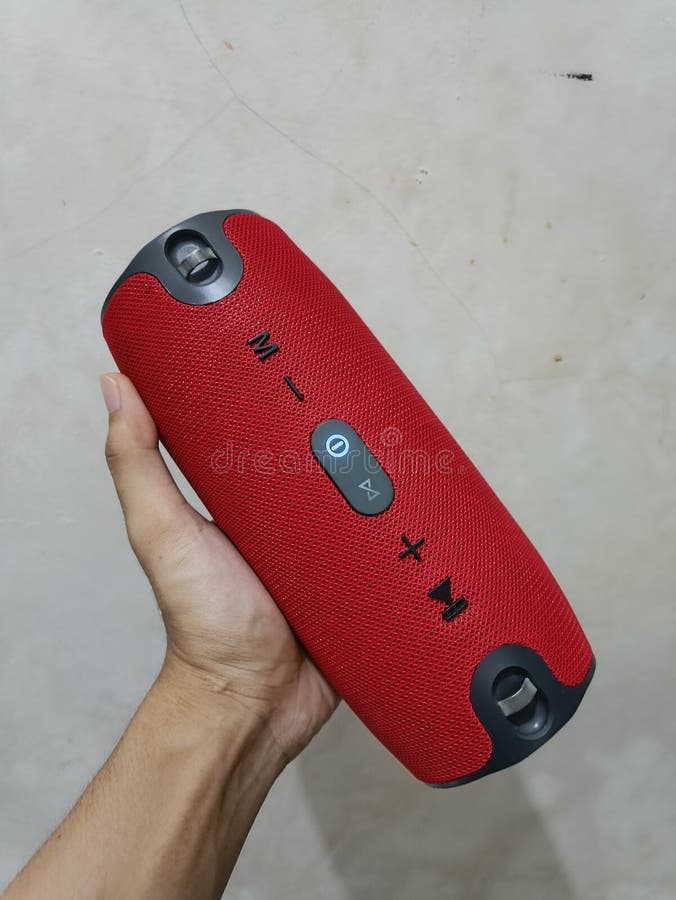 Hand Holding Red Music Player Stock Photo - Image of relax, speaker ...