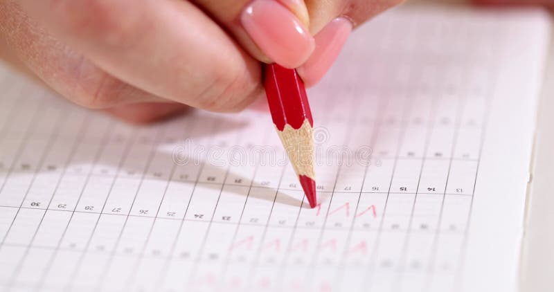 Hand Holding Red Pencil Makes Choice by Ticking Form of Vote Stock ...