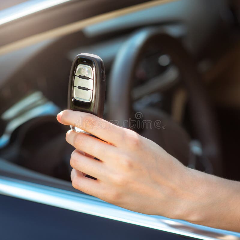 Hand Holding Remote Car Key Stock Image - Image of human, expensive ...