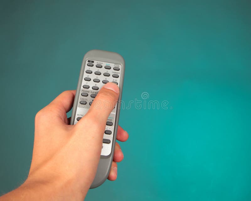 Hand Holding a Remote Control Stock Photo - Image of bright, movie ...