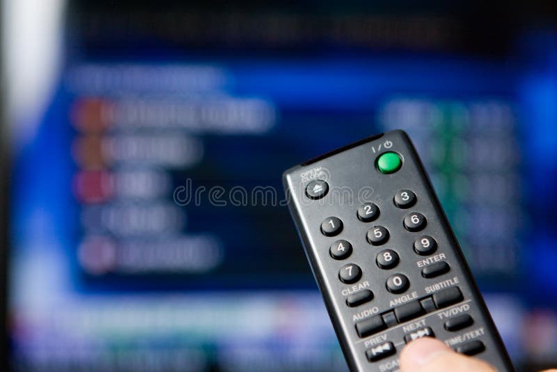 TV remote in hand stock image. Image of leisure, intelligence - 137639023