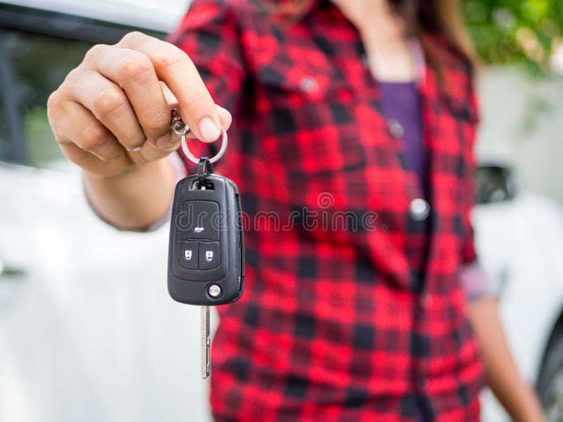 Hand Holding the Remote Control Car Alarm Systems Stock Photo - Image ...