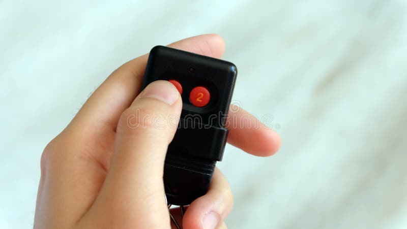 Hand Holding Remote Control Device Stock Image - Image of finger ...