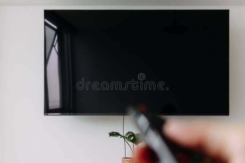 Hand Holding Remote Point at Tv. Concept of Watching Tv. Stock Photo ...